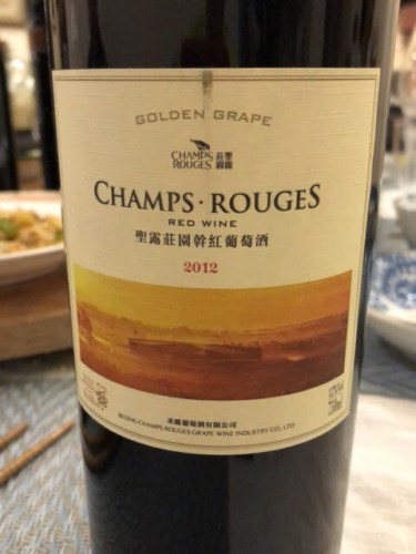 Champs Rouges Golden Grape Red | Vivino US